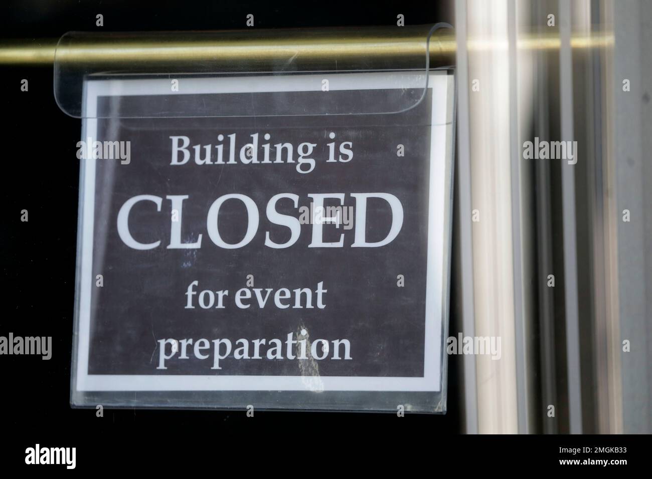 A "building is closed" sign is shown at an entrance of The Church of ...