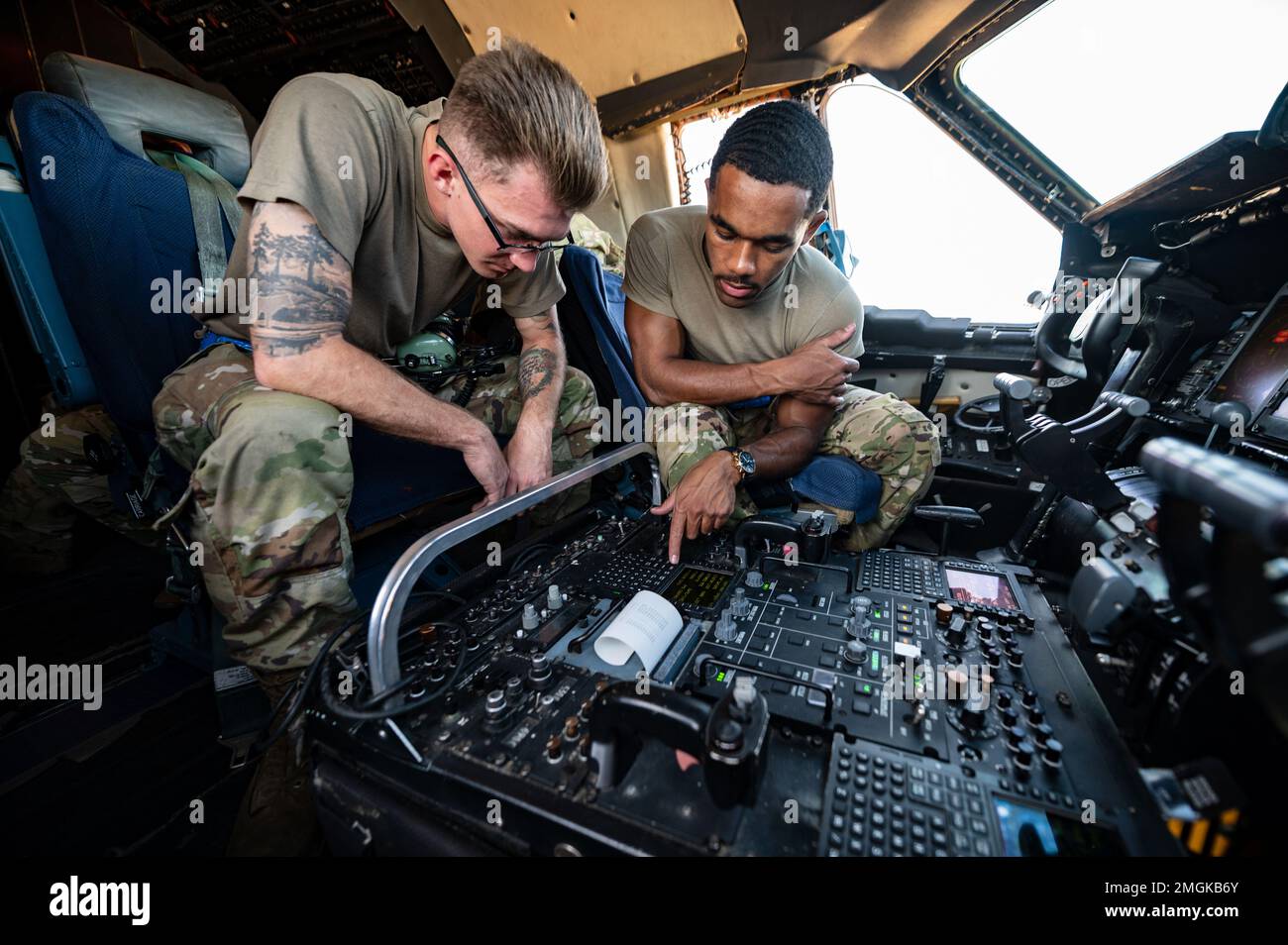 U.S. Air Force Senior Airman Resean Thomas, right, 60th Aircraft ...