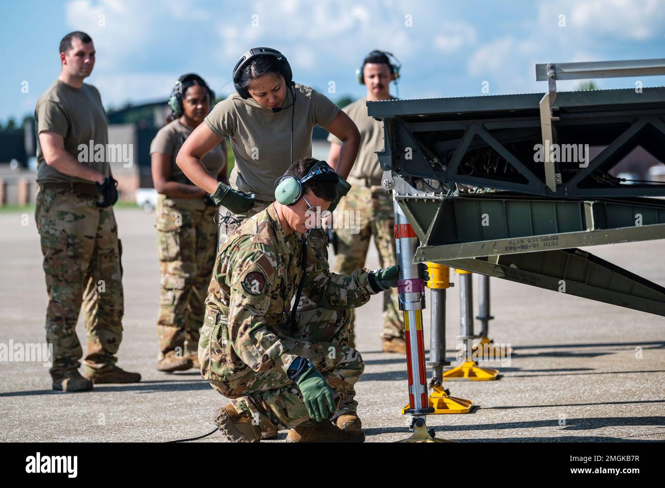 U.S. Air Force Tech. Sgt. Beverly Castro, standing, 22nd Airlift ...