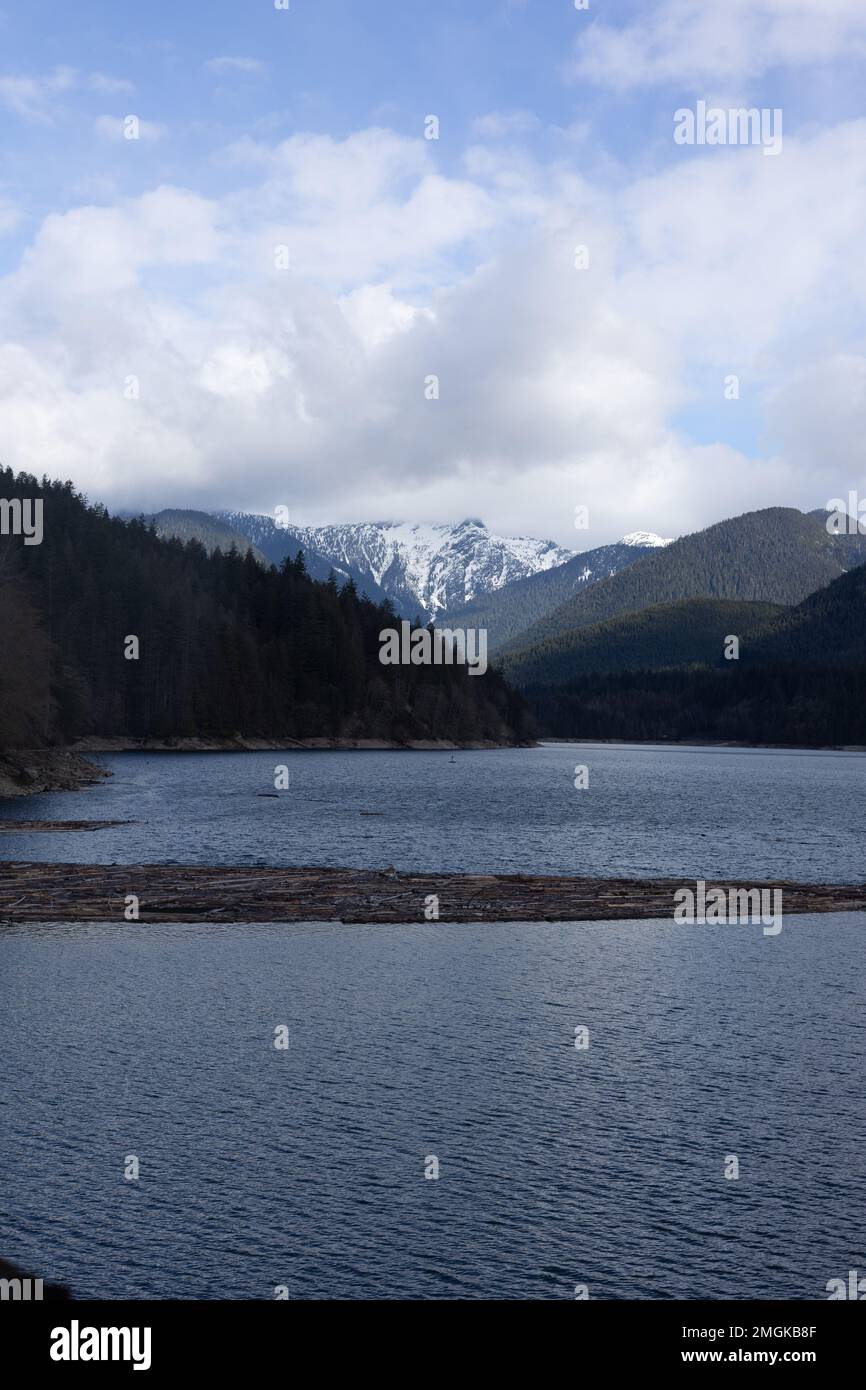 A scenic view of a rocky mountainous landscape with a lake in the ...