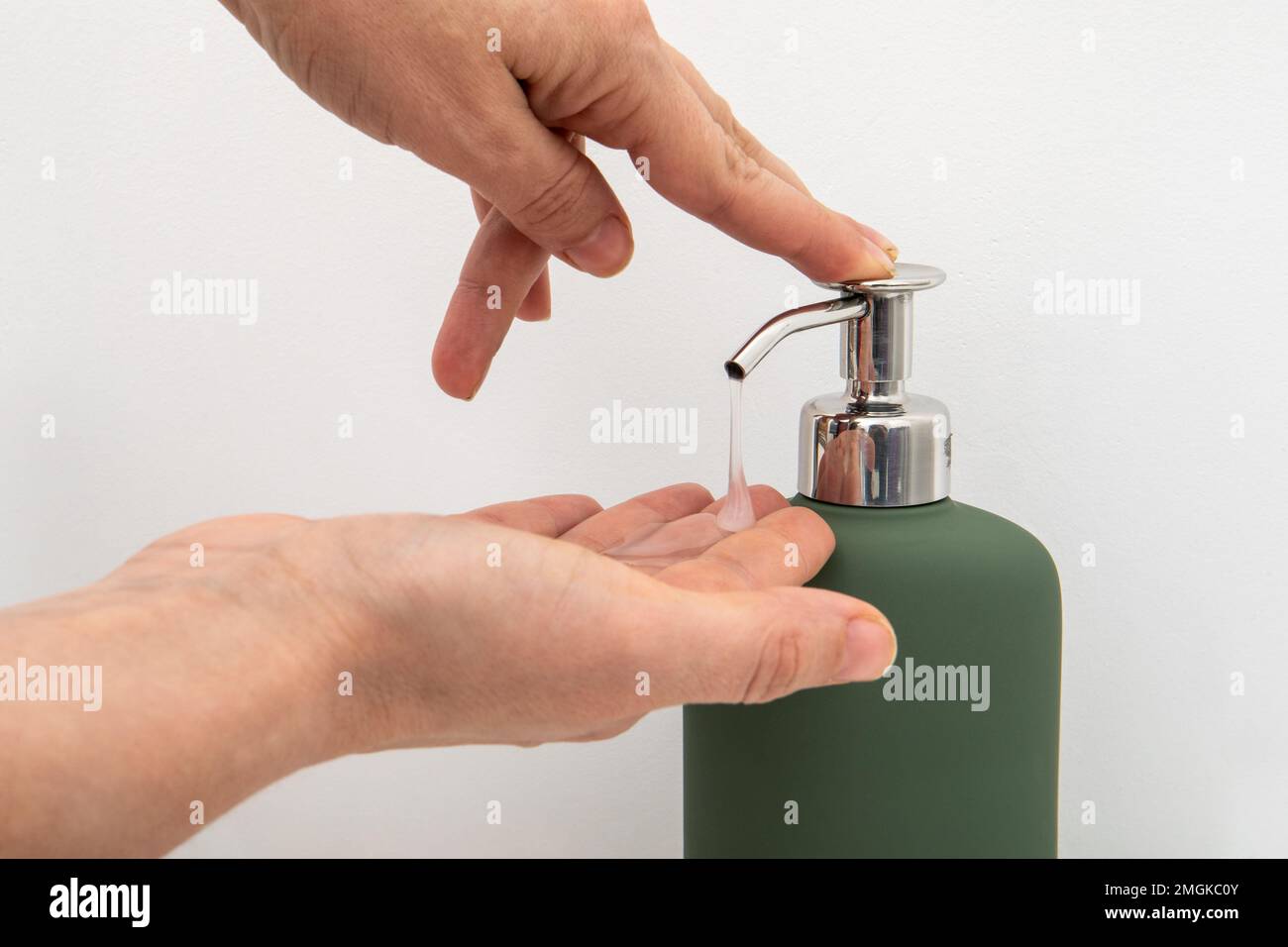 Woman wash dirty hands using soap dispenser, white backgound Stock ...