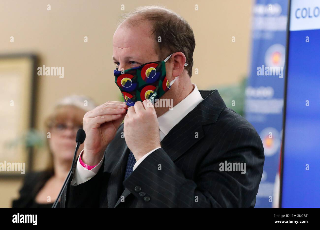 Colorado Gov. Jared Polis dons a mask to encourage state residents to ...
