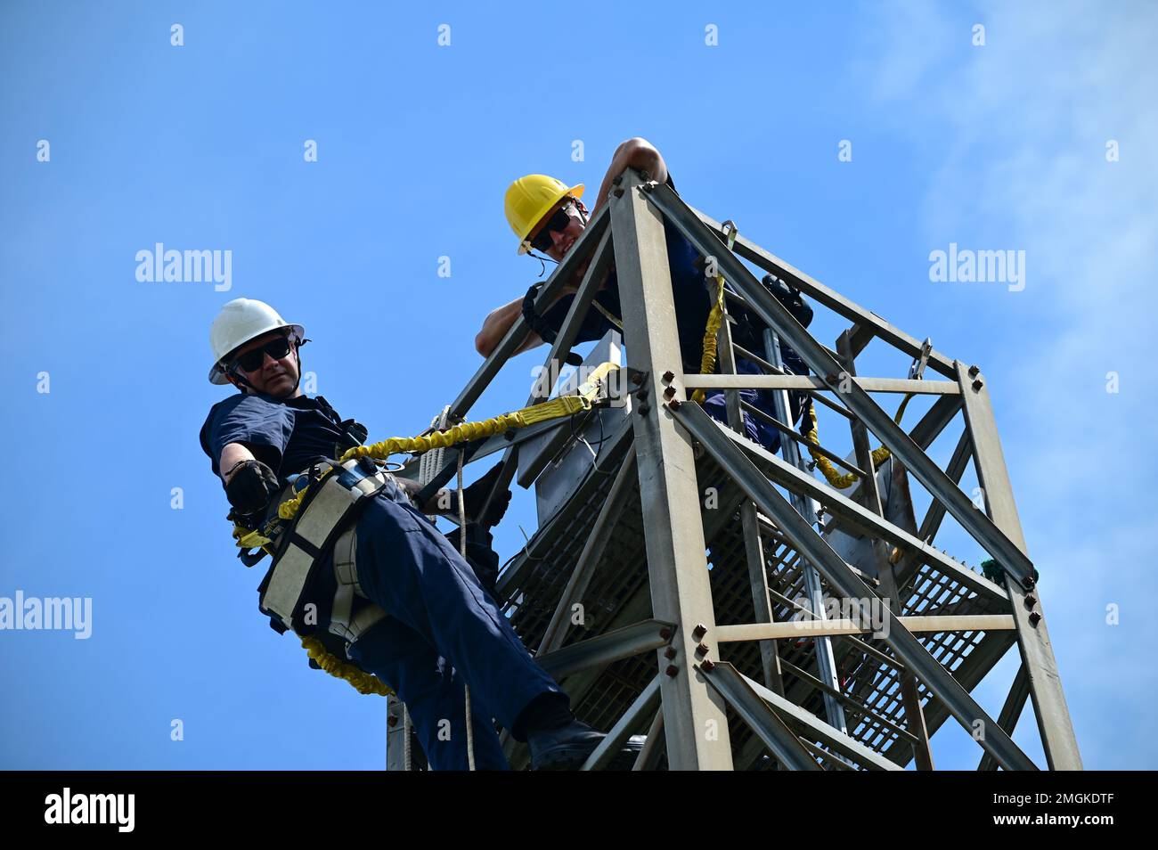 Coast Guard members from ANT Hampton perform navigation light ...
