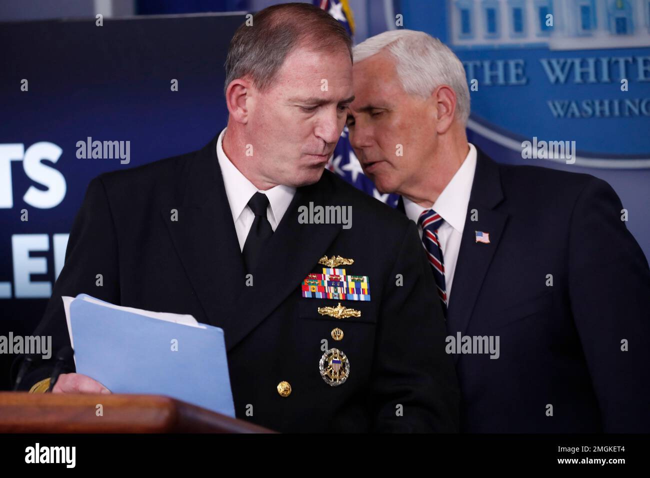 Vice President Mike Pence talks with Navy Rear Adm. John Polowczyk ...