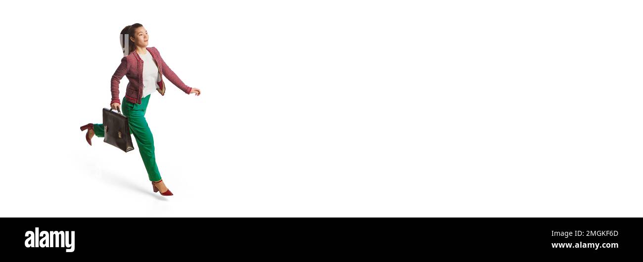 Running business woman wearing modern office style clothes hurrying at ...