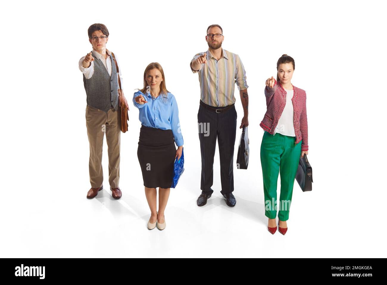 Four young people, businessmen, office workers standing together and ...