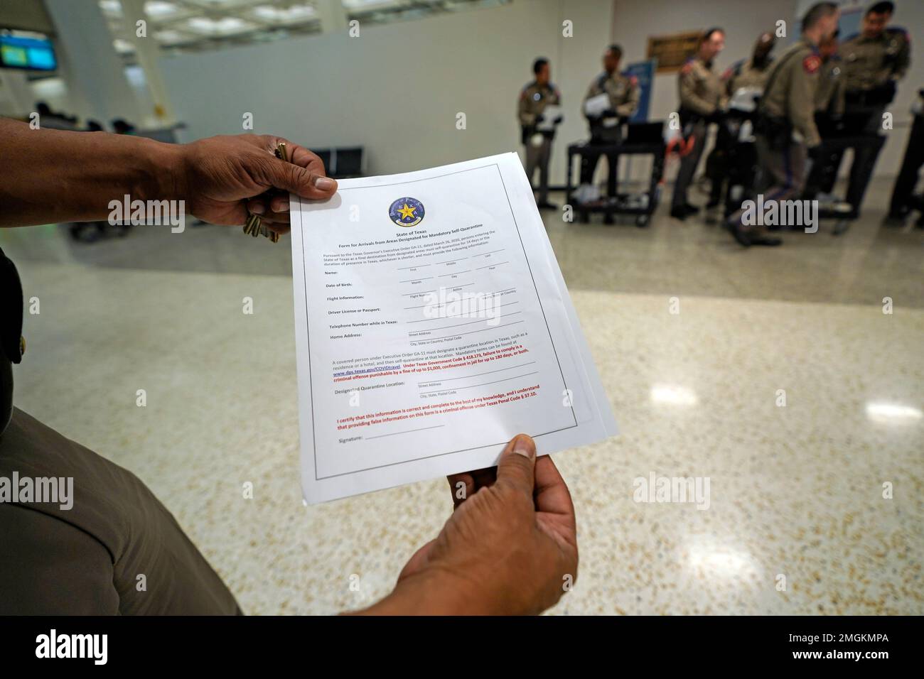 Texas Department of Public Safety Sgt. Richard Standifer holds a form ...