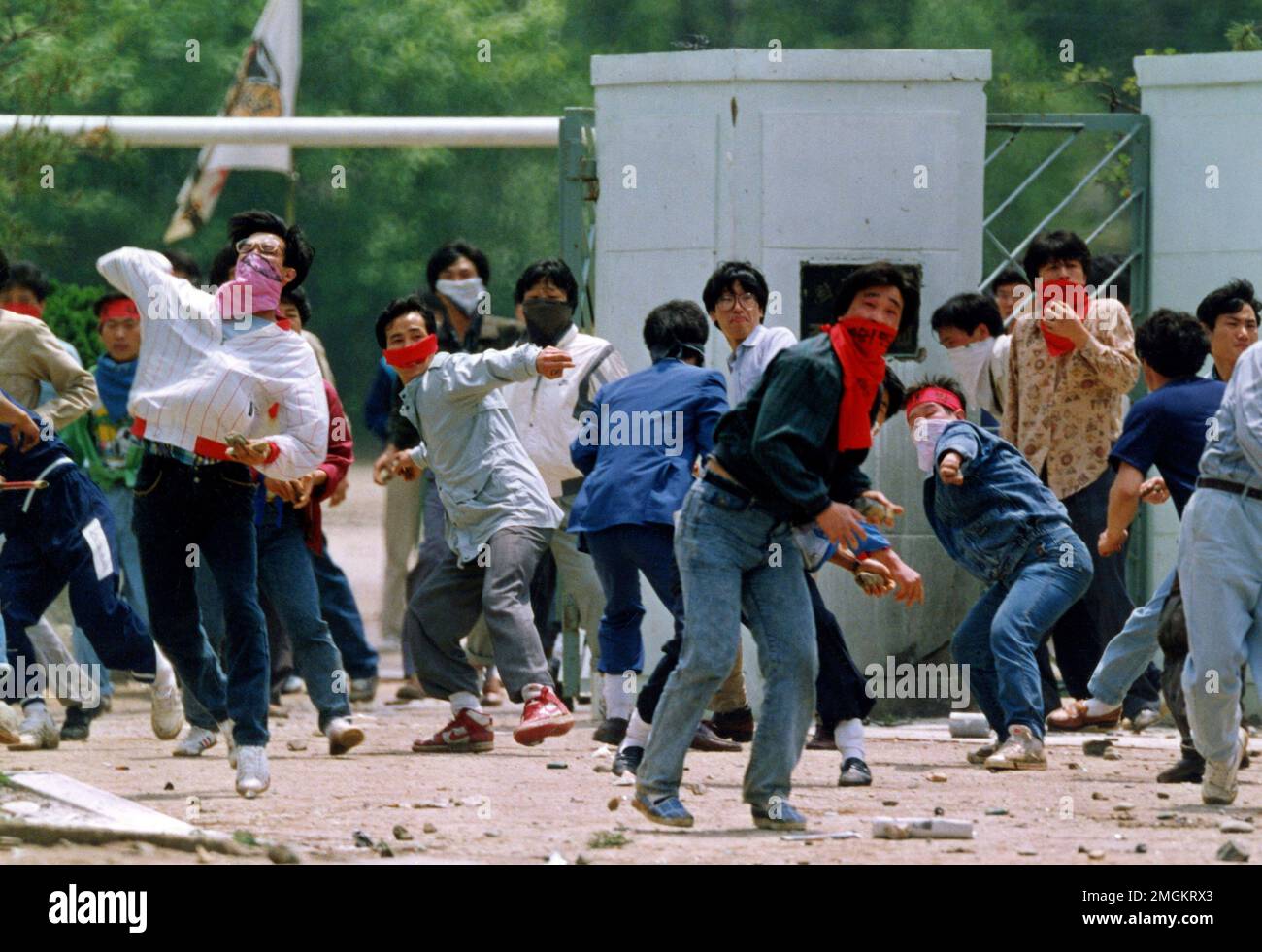 Radical students at the Chosun University hurl rocks against riot ...