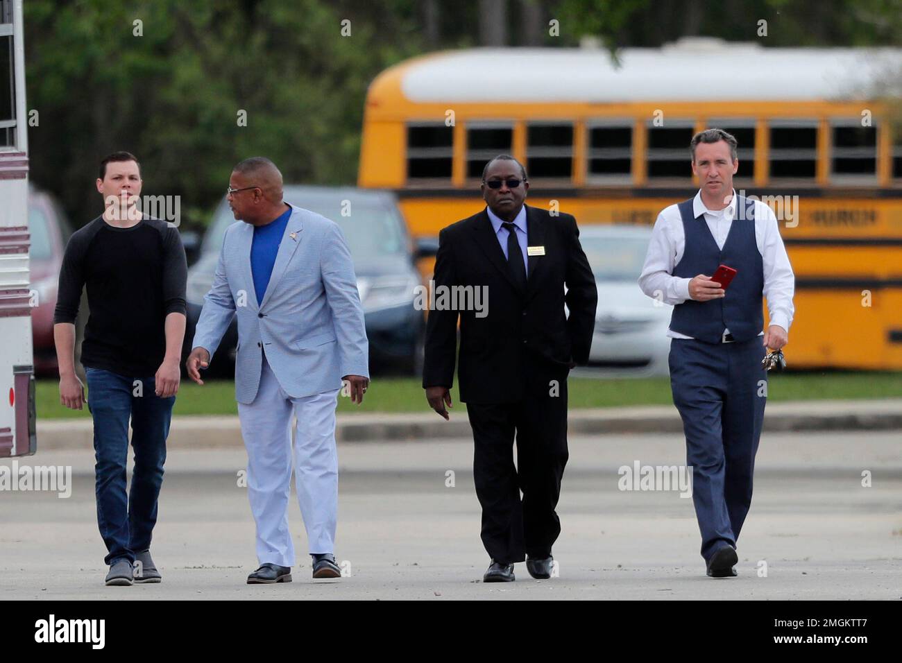 Pastor Tony Spell, right, walks with others after services at the Life ...
