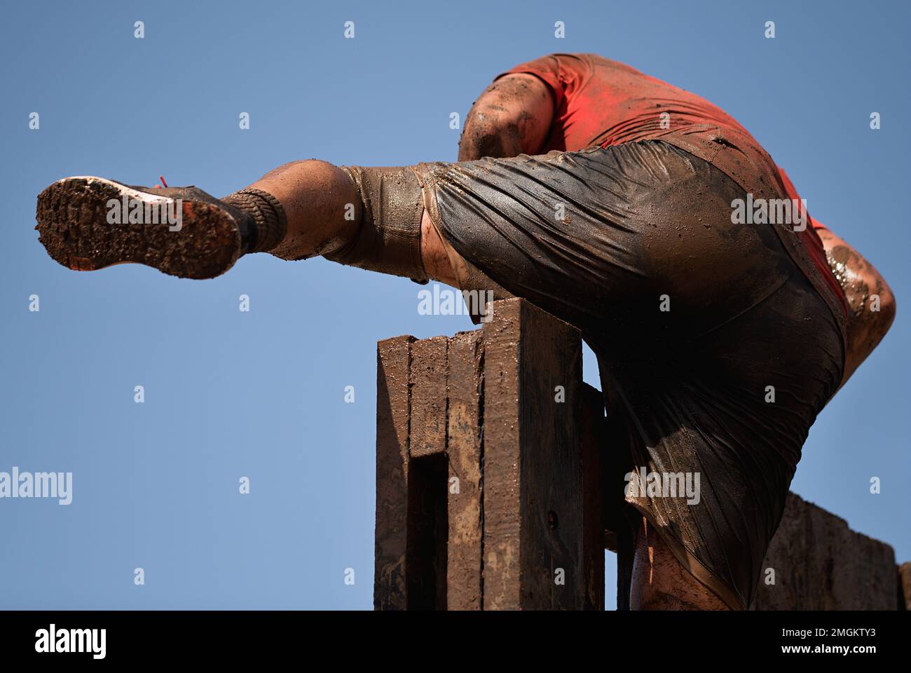 Mud race runners view of the participant for overcoming hurdles Stock ...