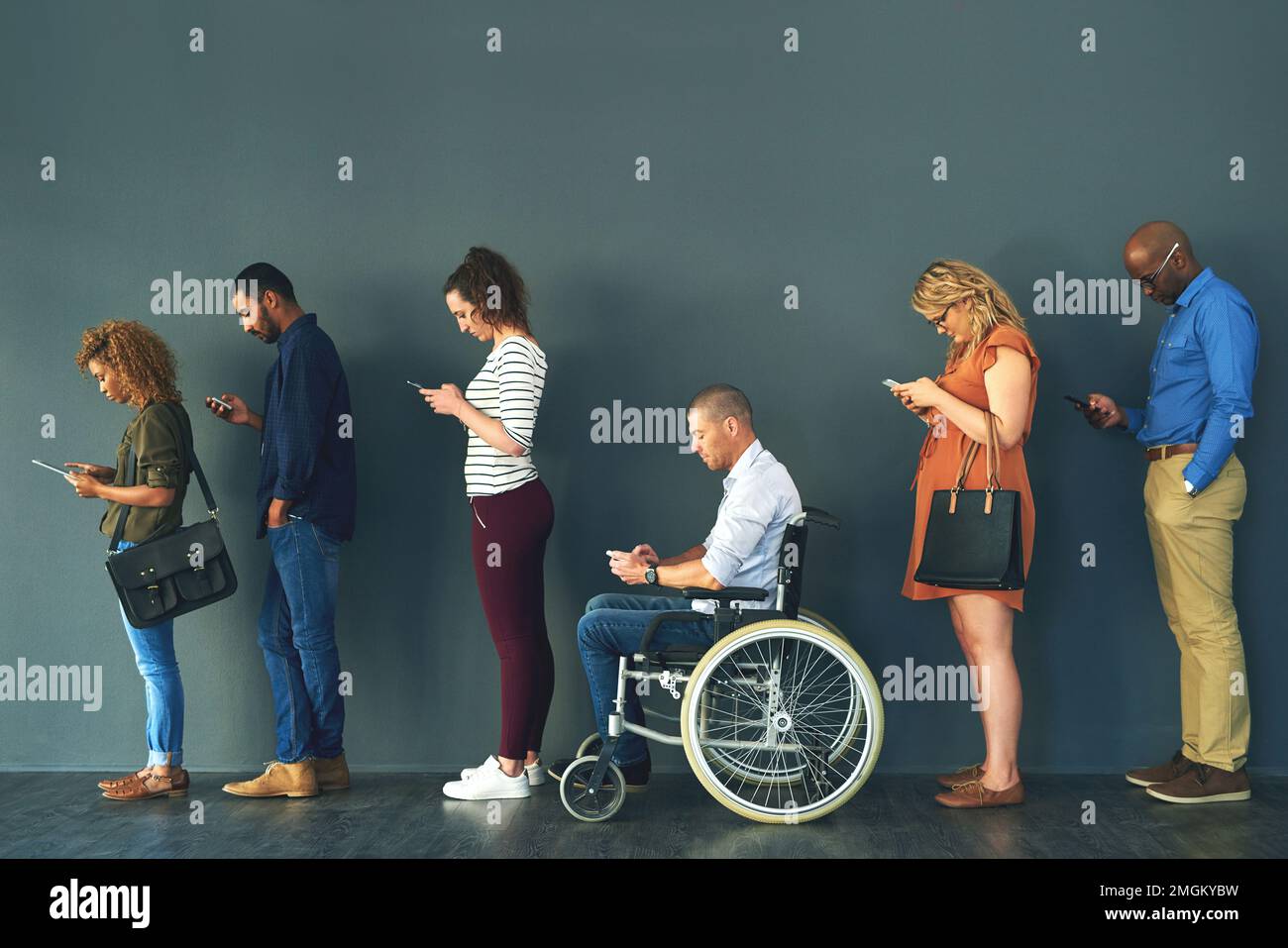 Different people but with the same habits. a group of people standing ...