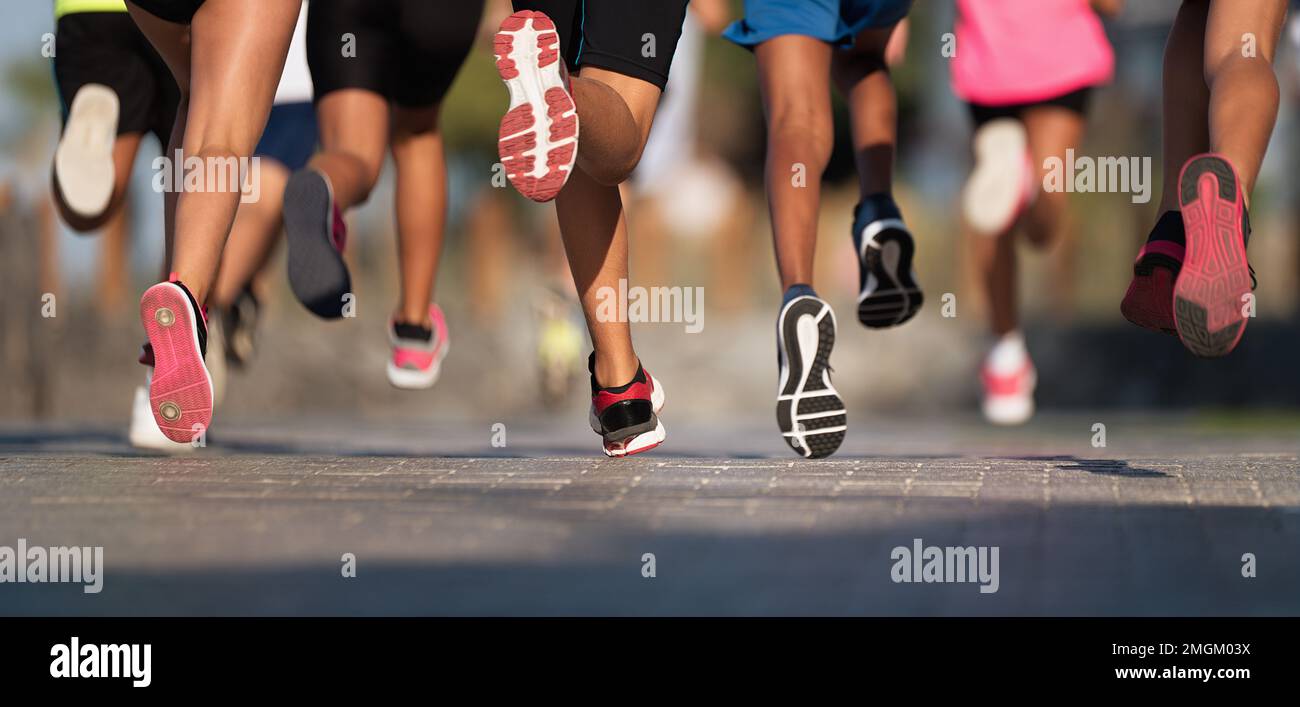 Running children, young athletes run in a kids run race,running on city ...