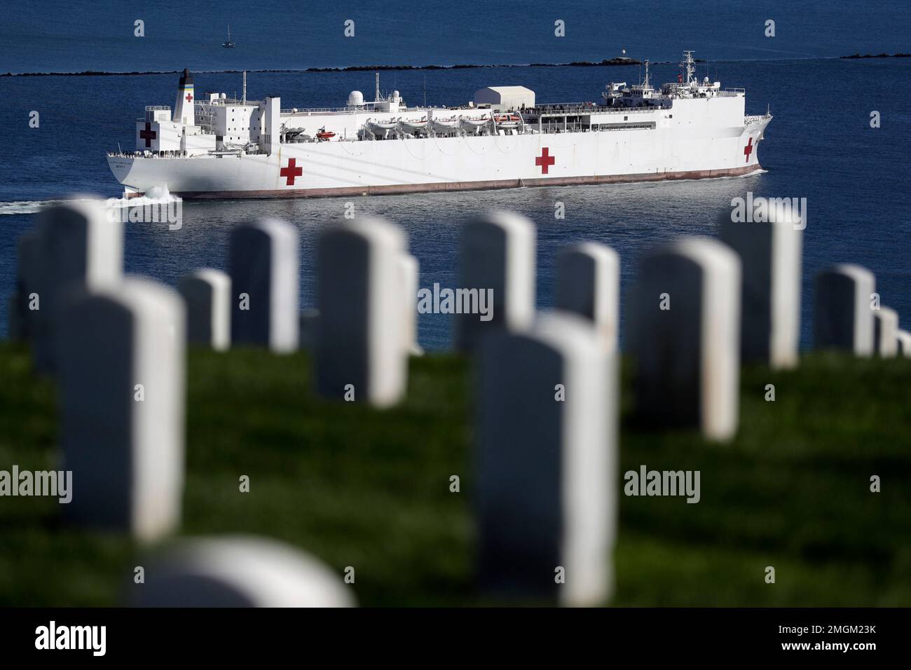 The USNS Mercy hospital ship leaves port Monday, March 23, 2020, in San ...