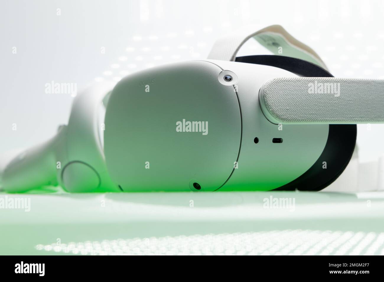 White new generation VR headset isolated on white background with green ...