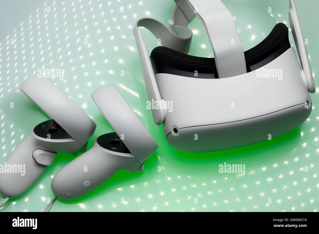 White new generation VR headset isolated on white background with green ...