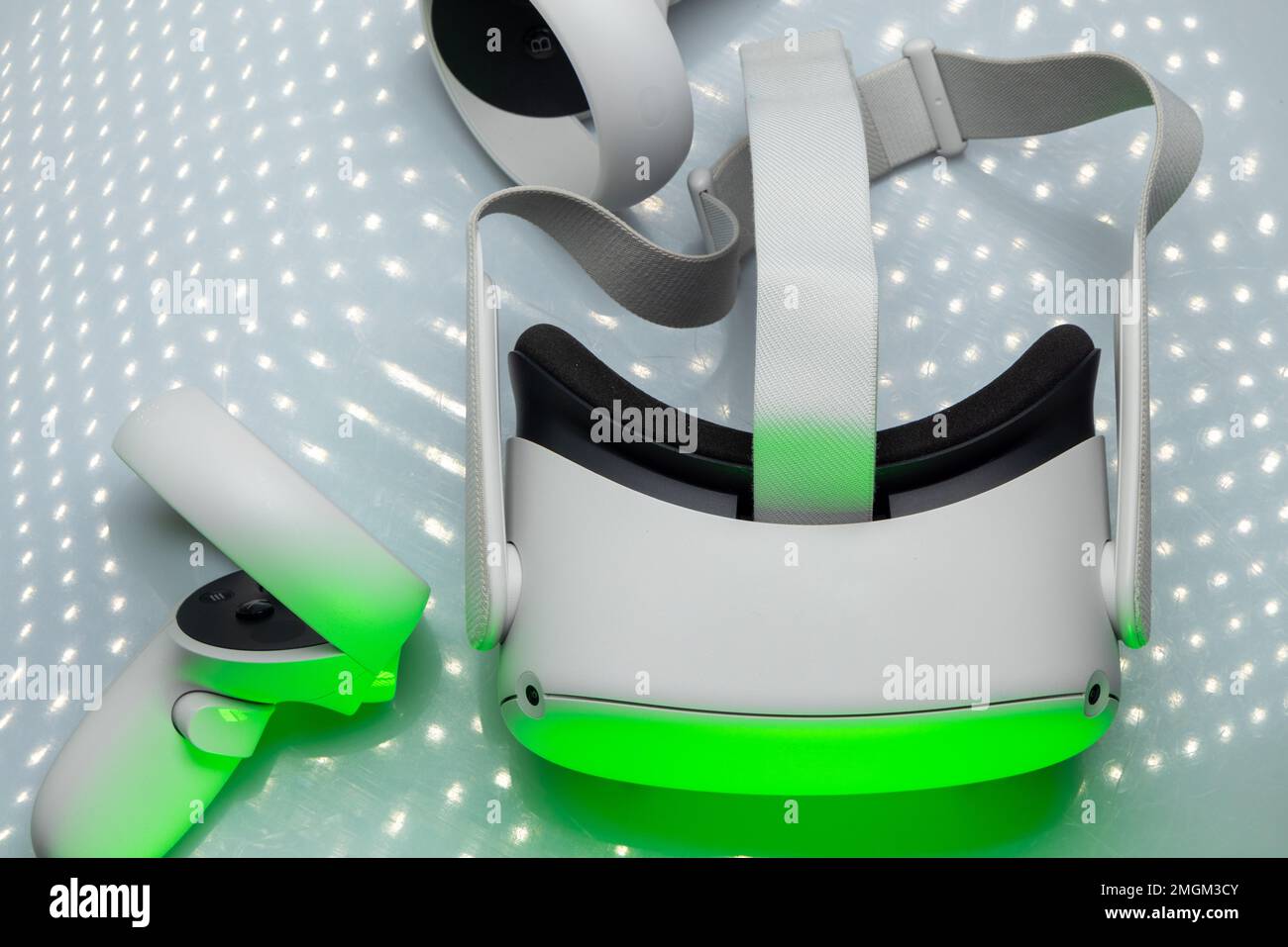 White new generation VR headset isolated on white background with green ...