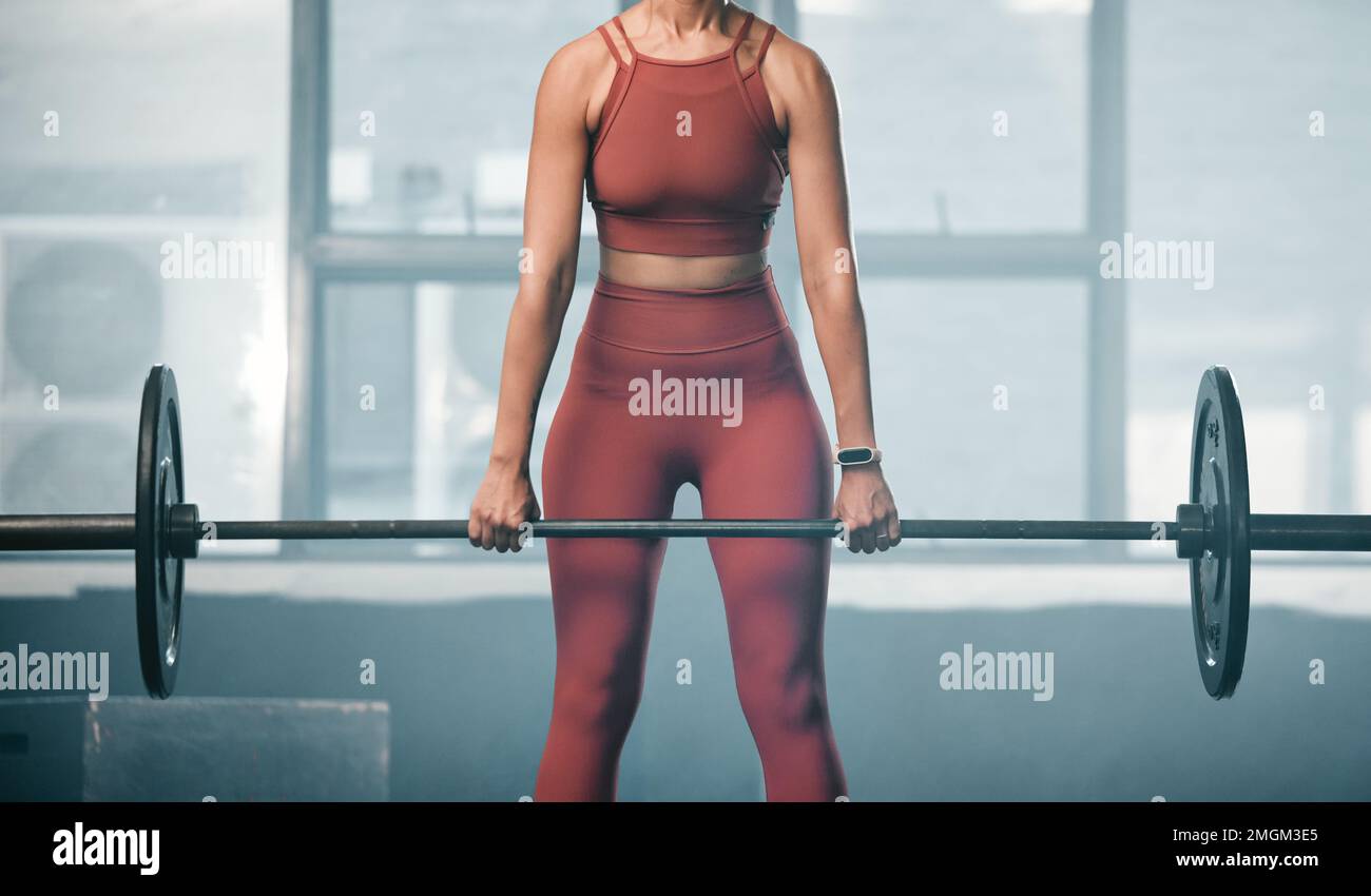 Gym body, barbell exercise and woman doing muscle fitness performance for health, strength ...