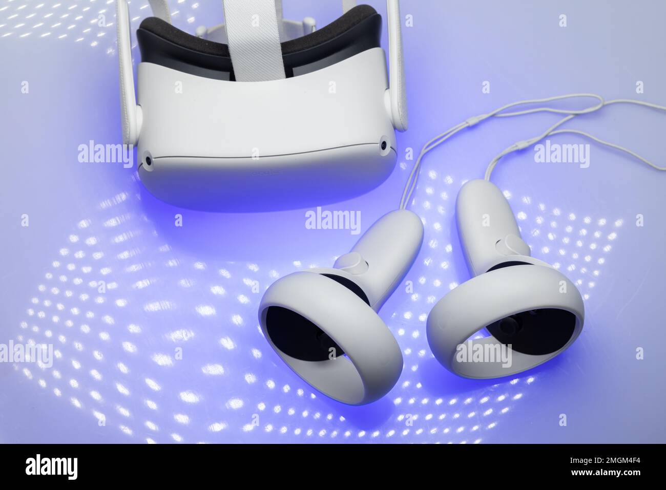 White new generation VR headset isolated on white background with blue ...