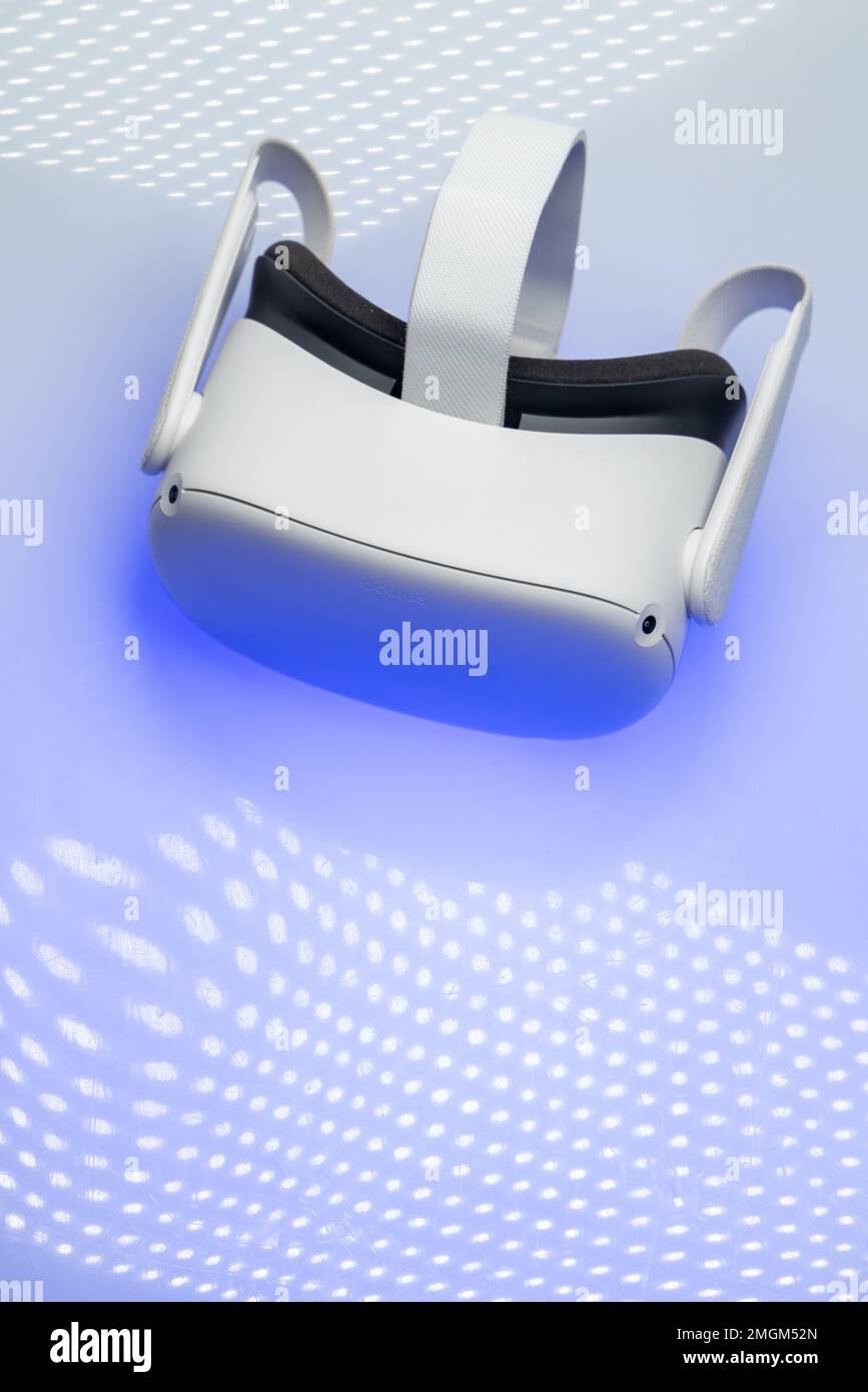 White new generation VR headset isolated on white background with blue ...