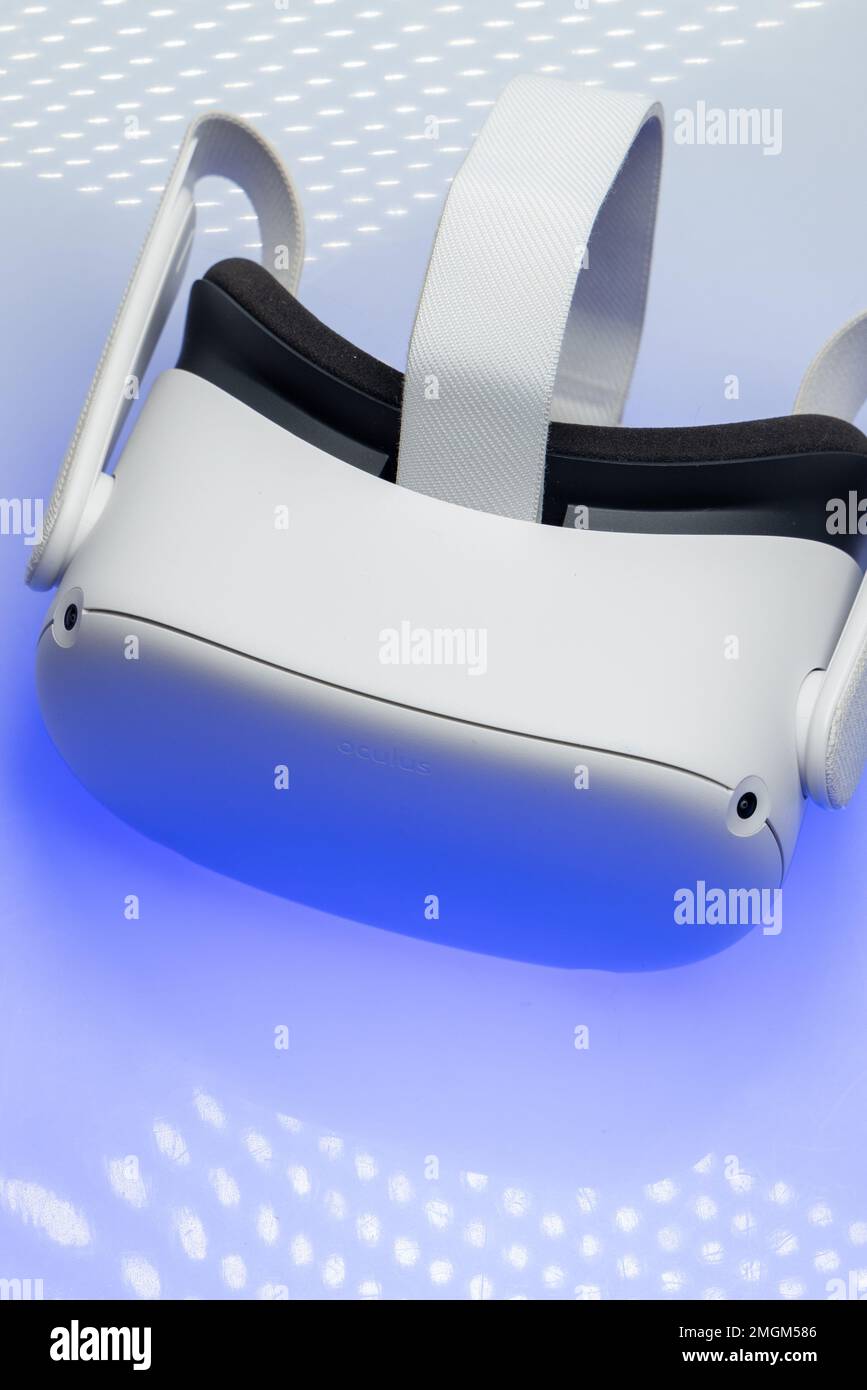 White new generation VR headset isolated on white background with blue ...