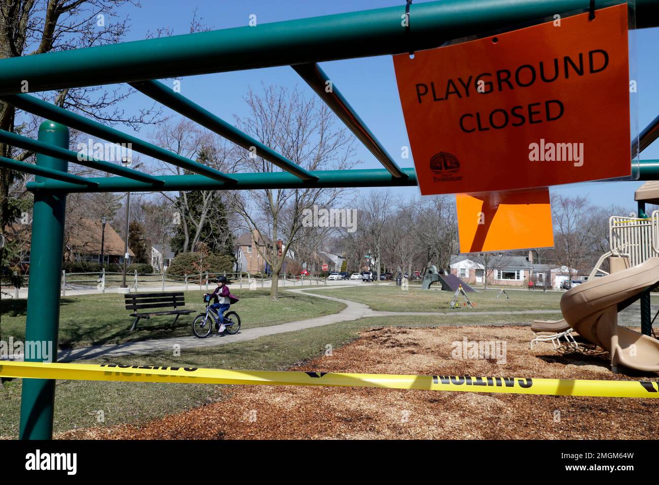 A sign announces that the playground is closed at Cartwright Park in ...