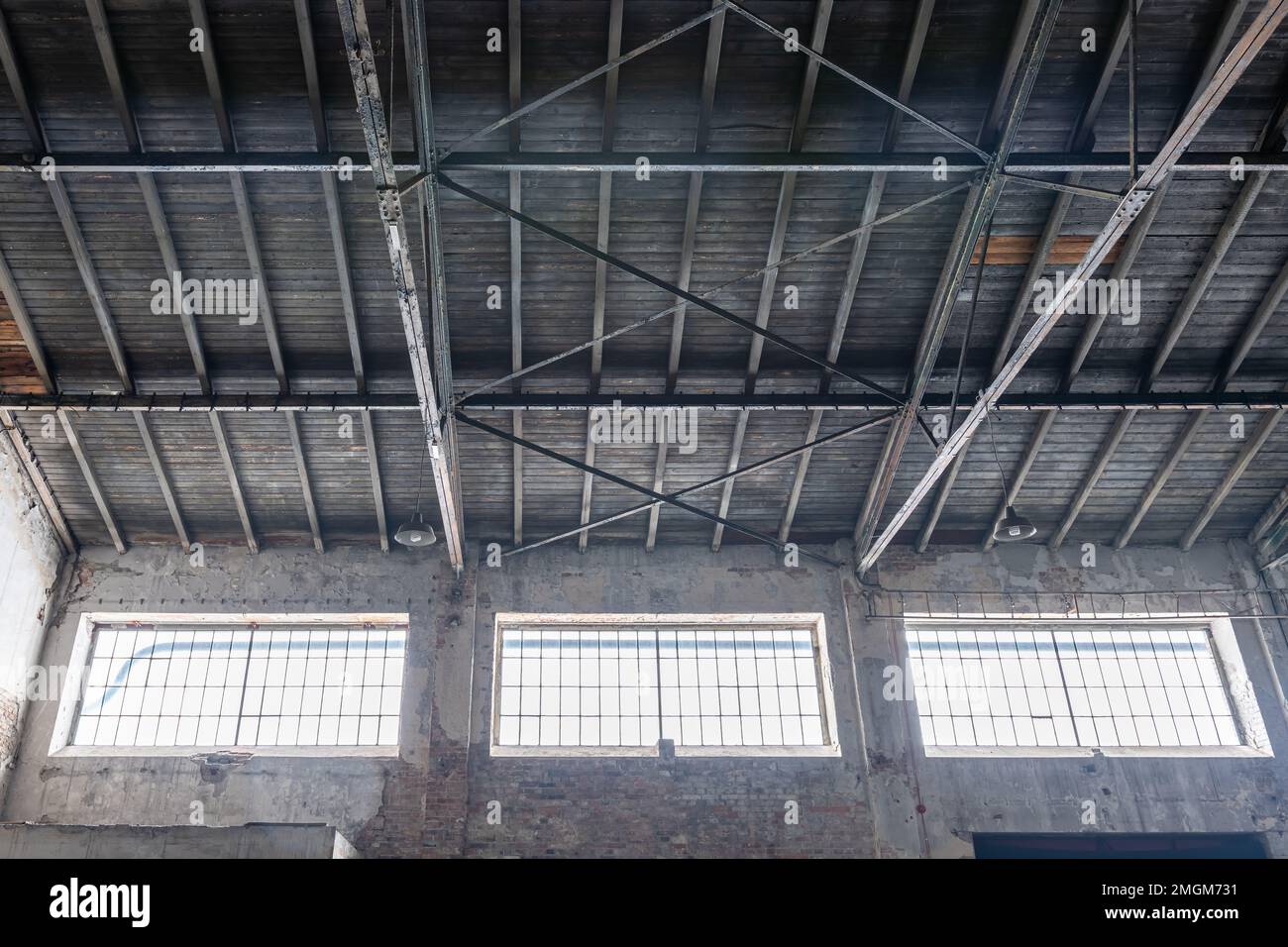 Gable roof truss of a large, vintage factory hall. Roofing construction ...