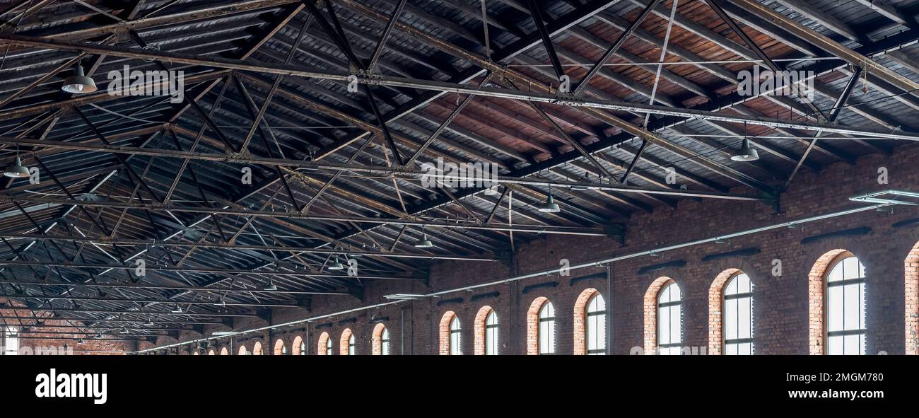 Gable roof truss of a large, vintage factory hall. Roofing construction ...