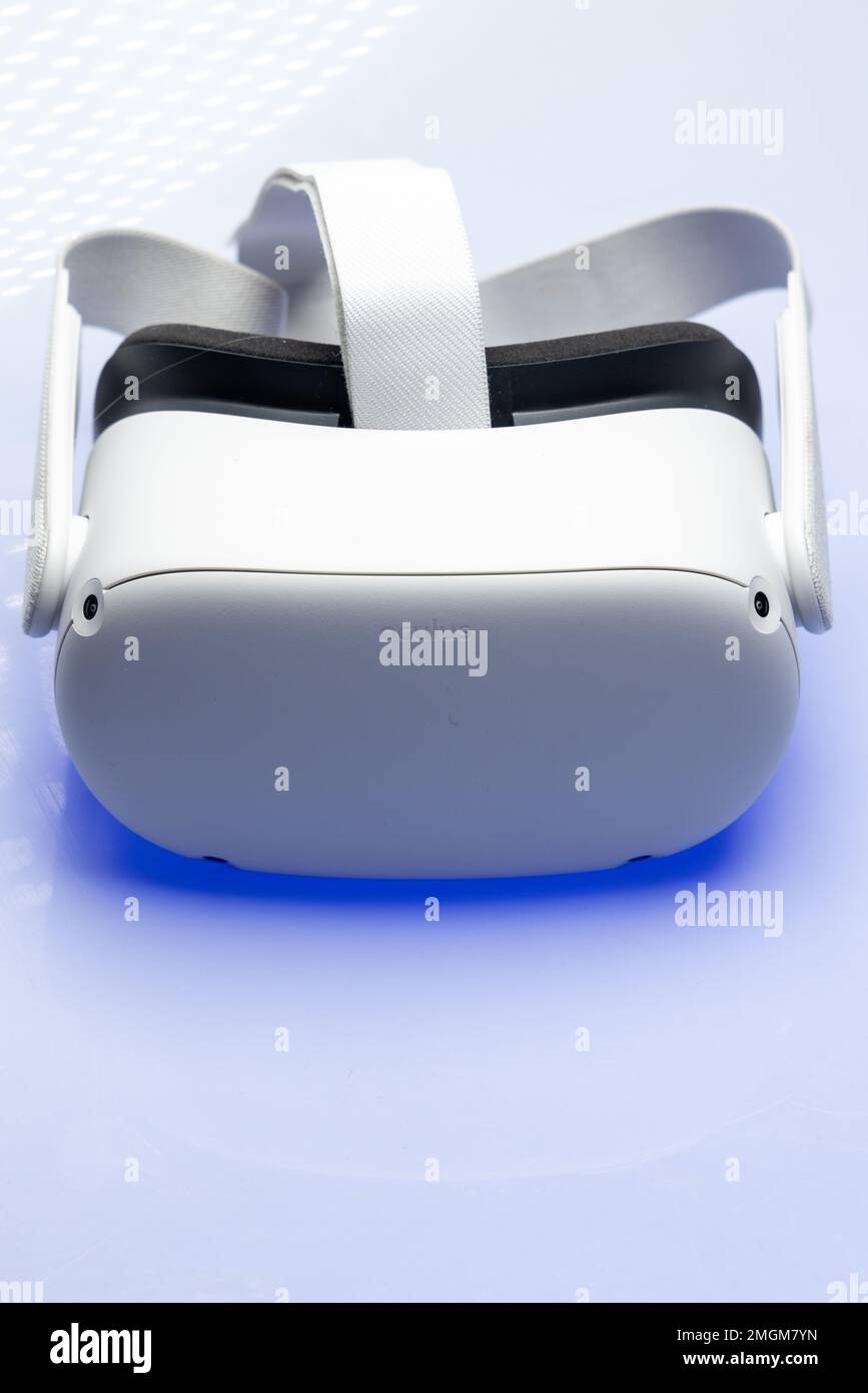 White new generation VR headset isolated on white background with blue ...