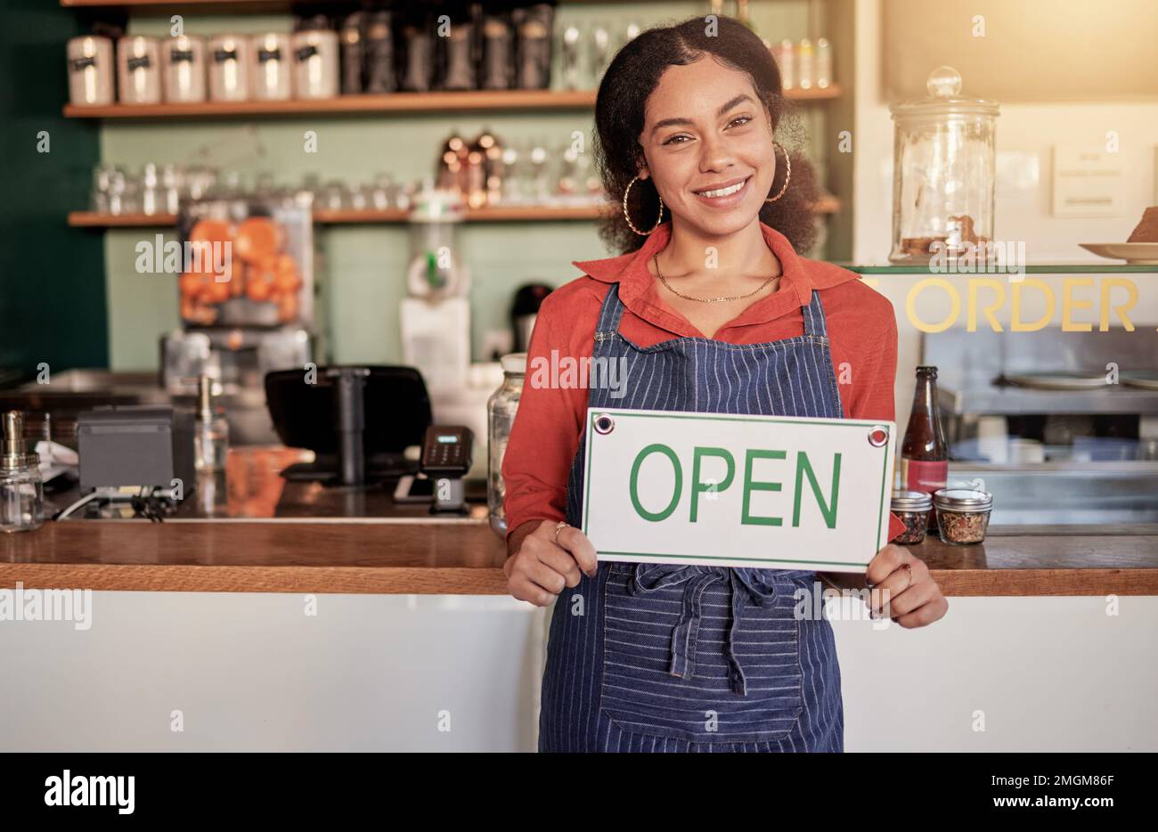 Small business, portrait or black woman with an open sign to welcome ...
