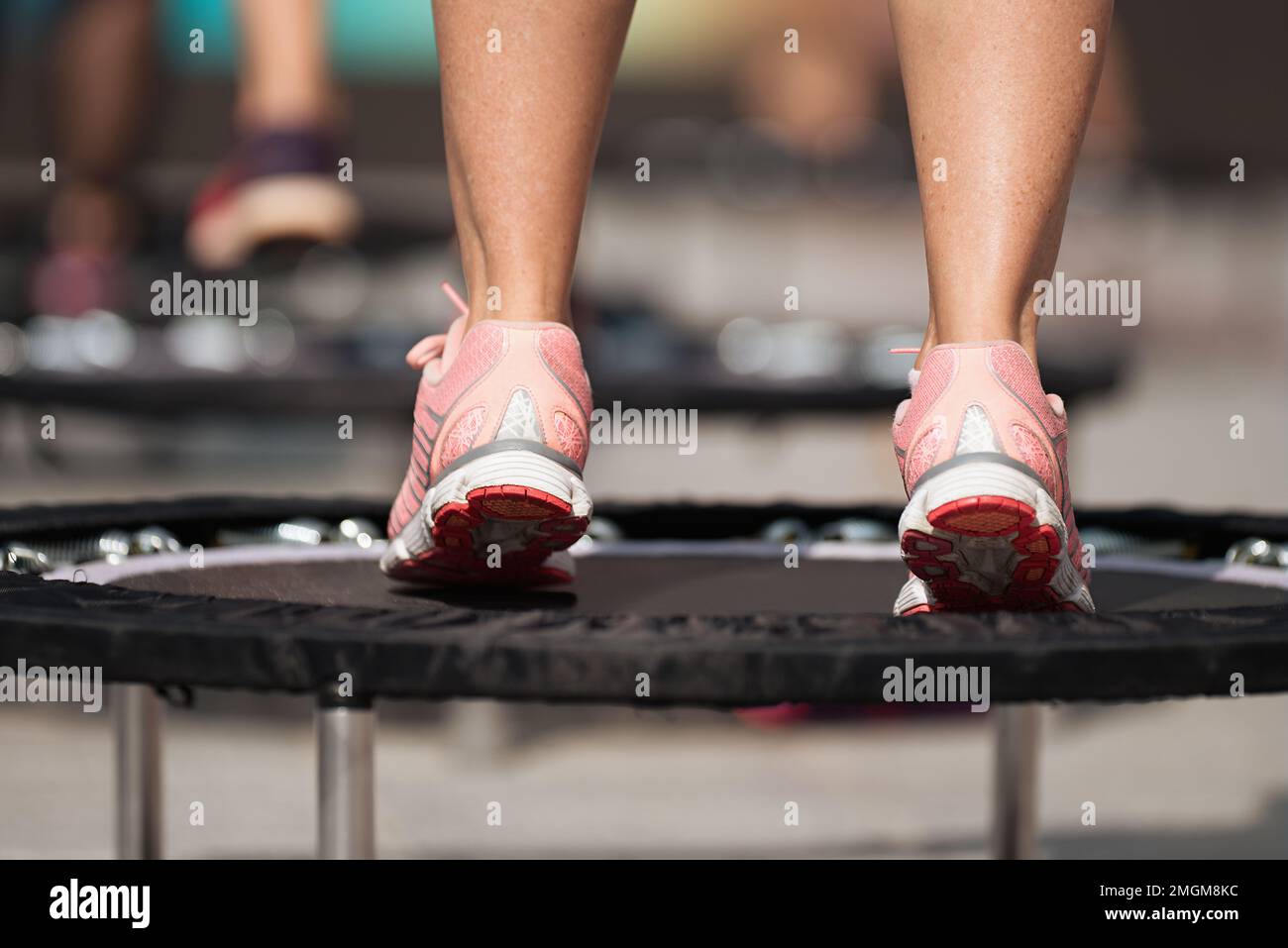 Fitness women jumping on small trampolines,exercise on rebounder Stock ...