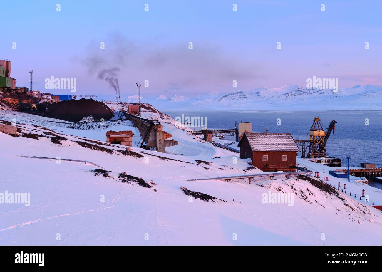 Storage of the coal from the mine. Russian coal mining town Barentsburg ...