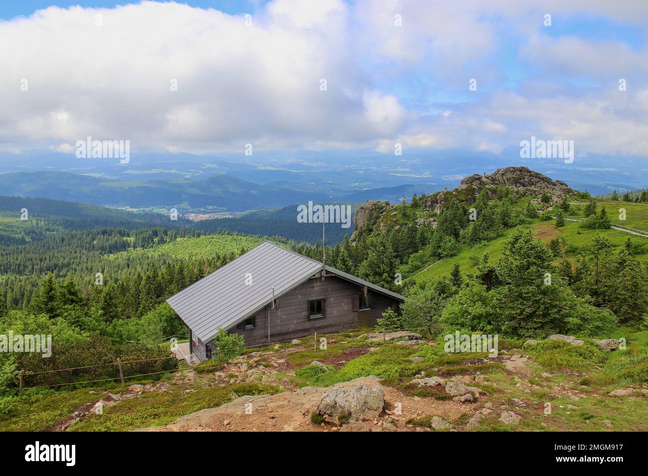 A view to the landscape with cottage in front from the peak of the ...