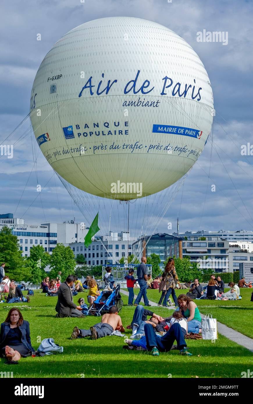 Paris, France, Crowd People Relaxing in Public Park, Parc Citroen ...