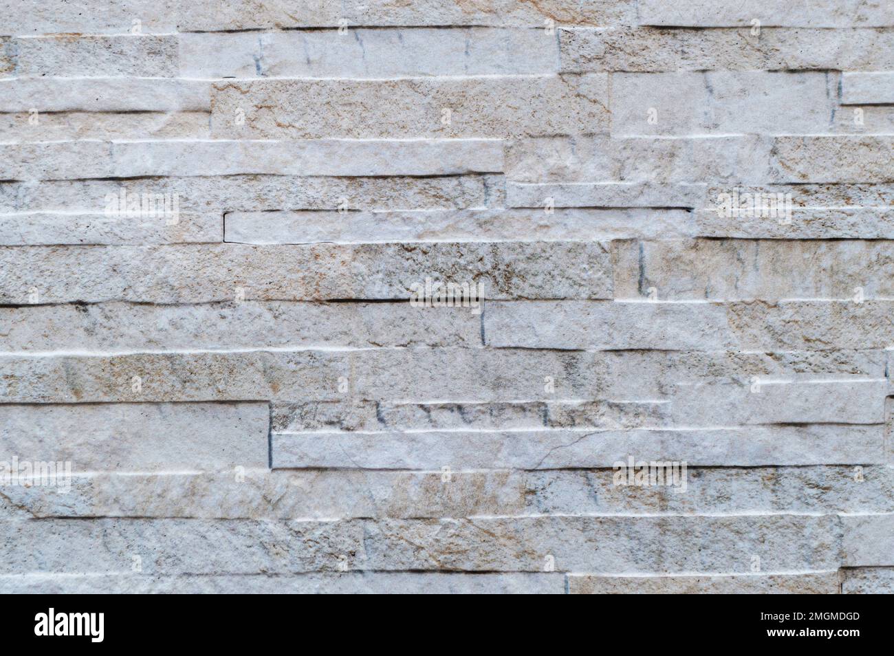 Wall of white and colored stones for advertisement background Stock ...