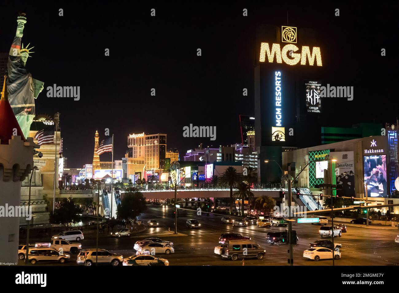 A night view of the Strip street with cars and illuminated buildings ...