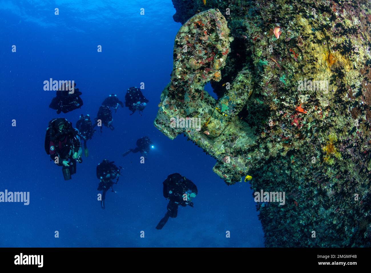 Rebreathers divers exploring one of the anchor from SS Thistlegorm ...