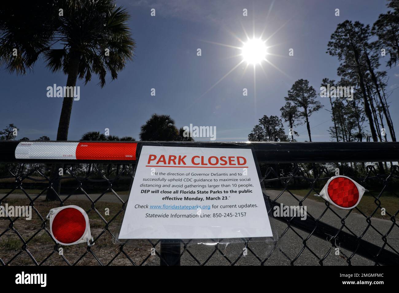 A closed sign, attached on the outside fence at the Alafia River State ...