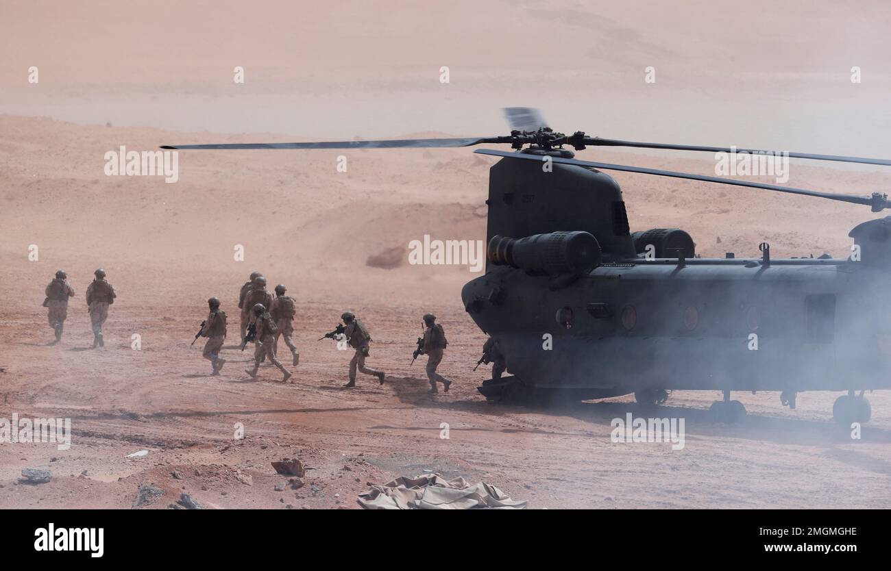 Emirati troops disembark an Emirati Boeing CH-47 Chinook during a ...