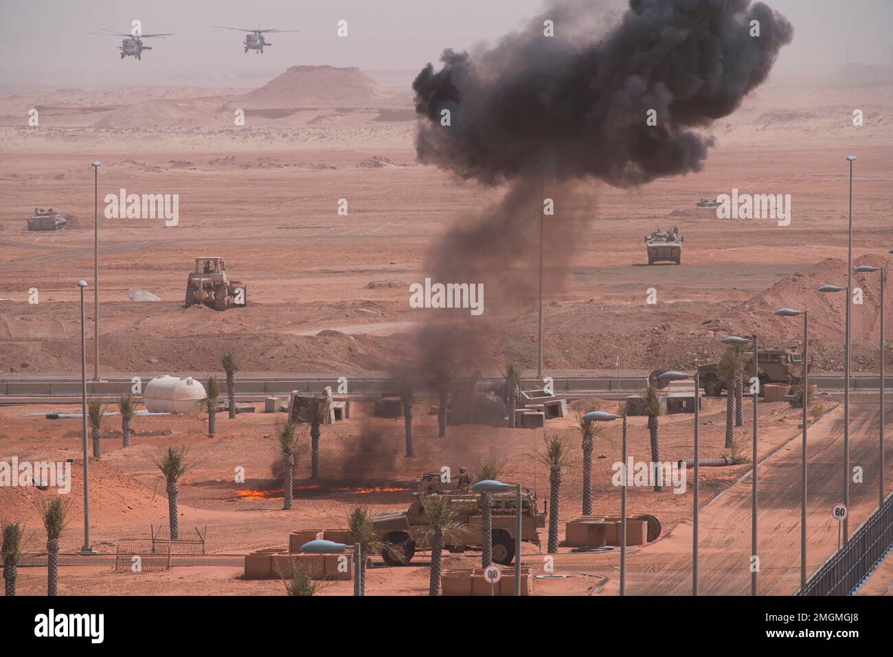 Emirati forces advance by land and air during an exercise at an Emirati ...