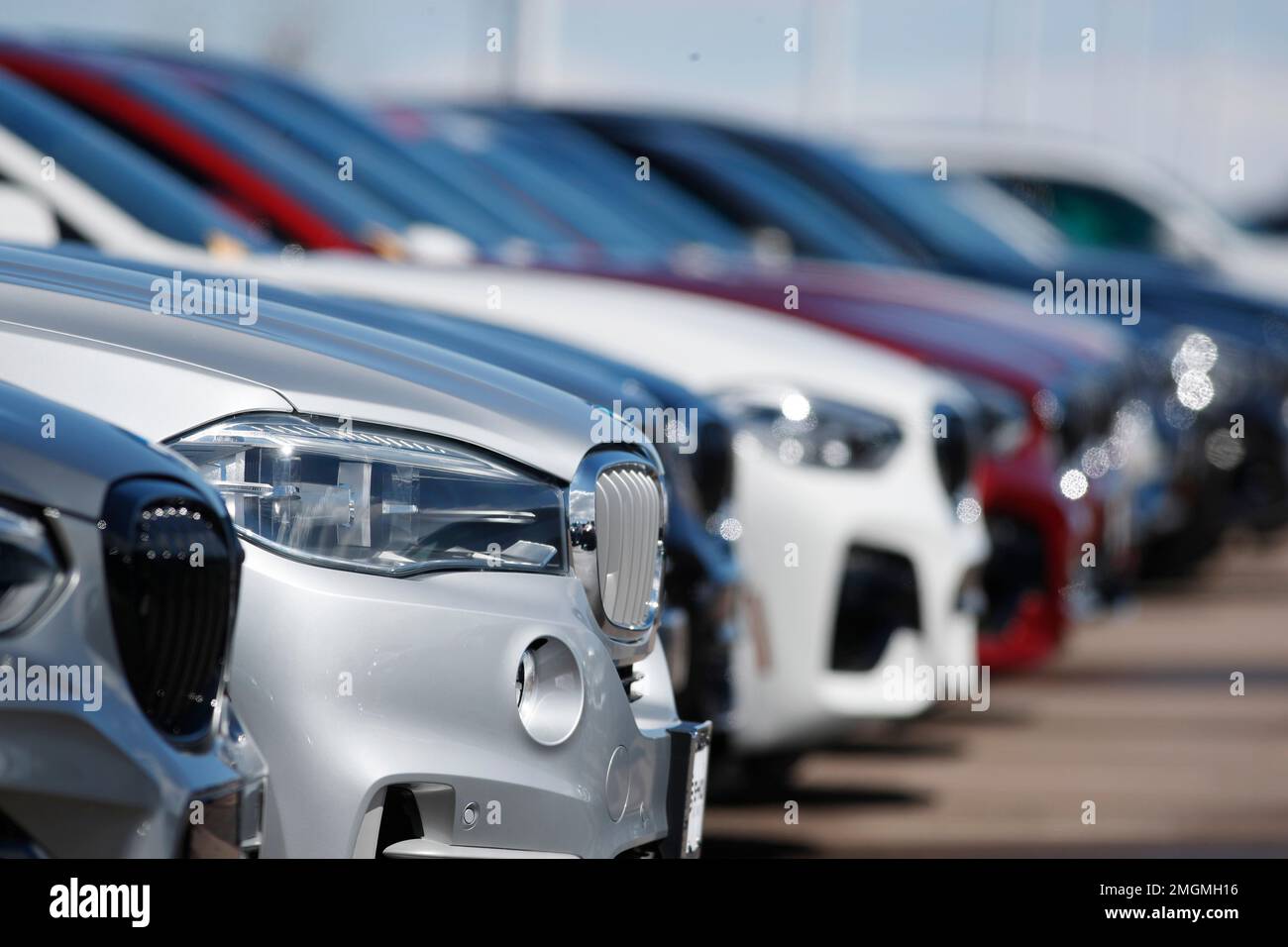 In this Sunday, March 22, 2020, photograph, a row of unsold 2020 X3 ...