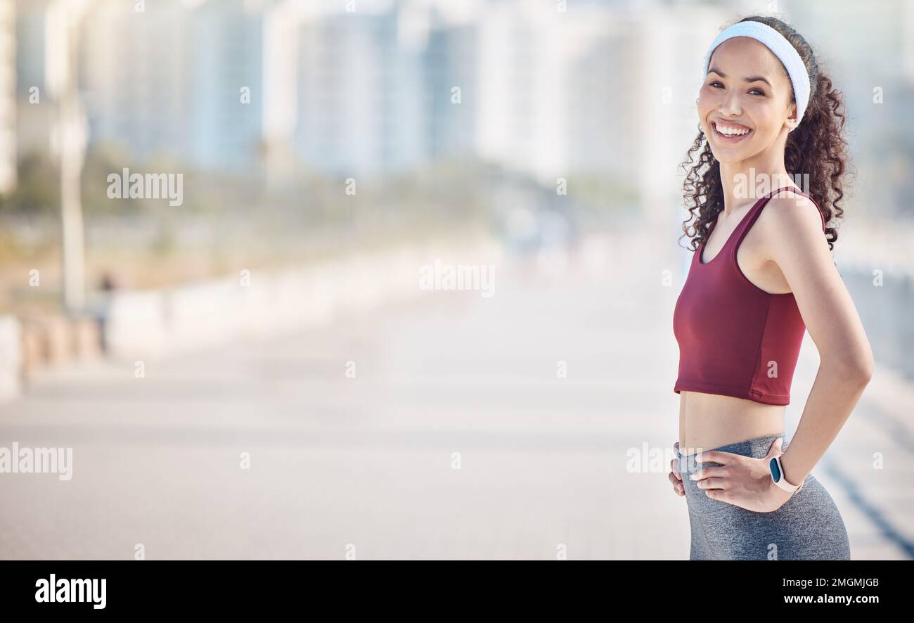 Happy woman, portrait and fitness with arms akimbo in city for exercise ...