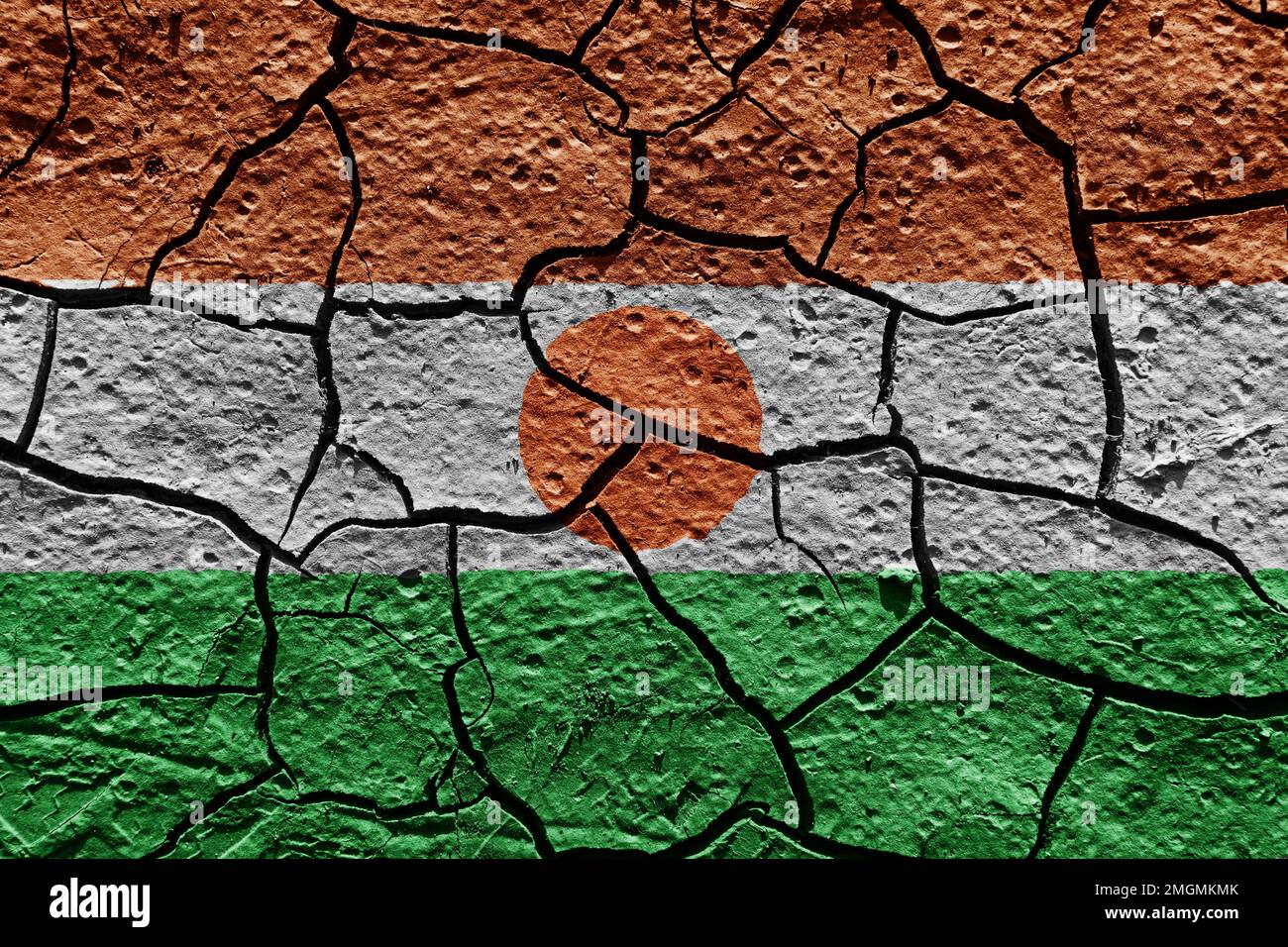 Niger flag on a mud texture of dry crack on the ground Stock Photo - Alamy