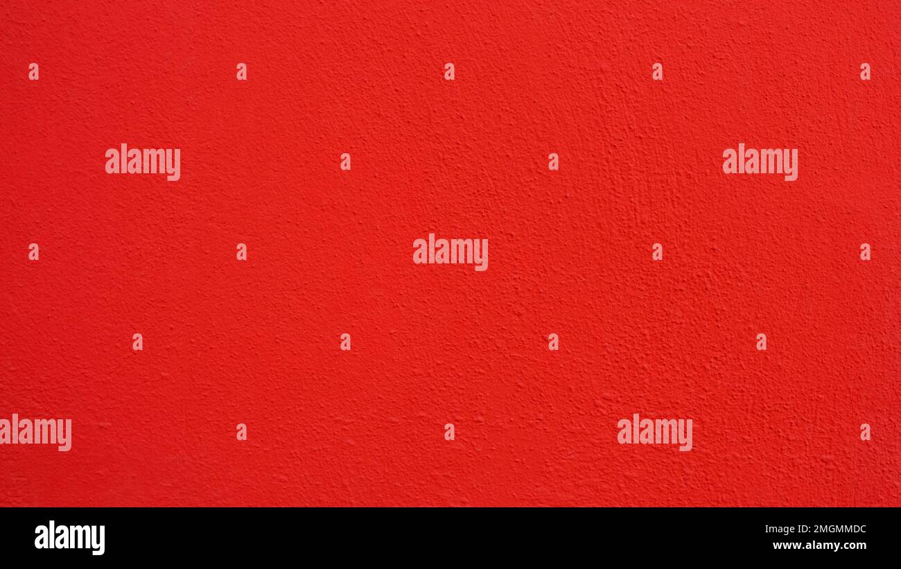 Textured wall in vibrant saturated red color Stock Photo - Alamy
