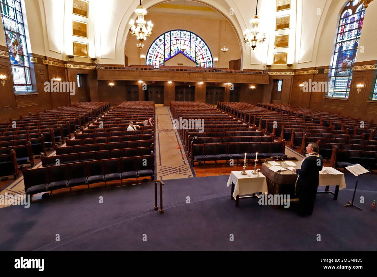 Rodef Shalom Rabbi Aaron Bisno, right, delivers his sermon during an ...