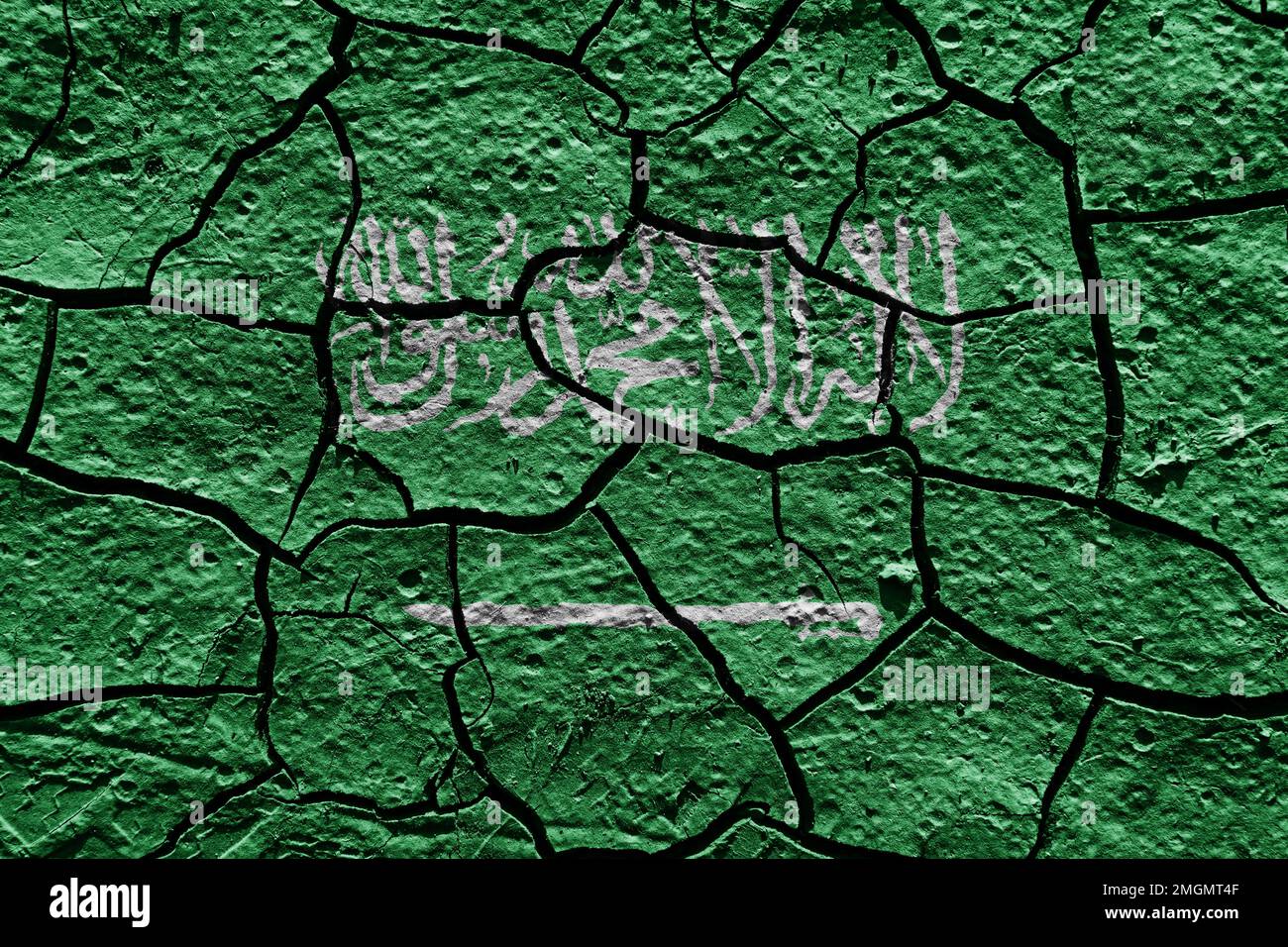 Saudi Arabia flag on a mud texture of dry crack on the ground Stock ...