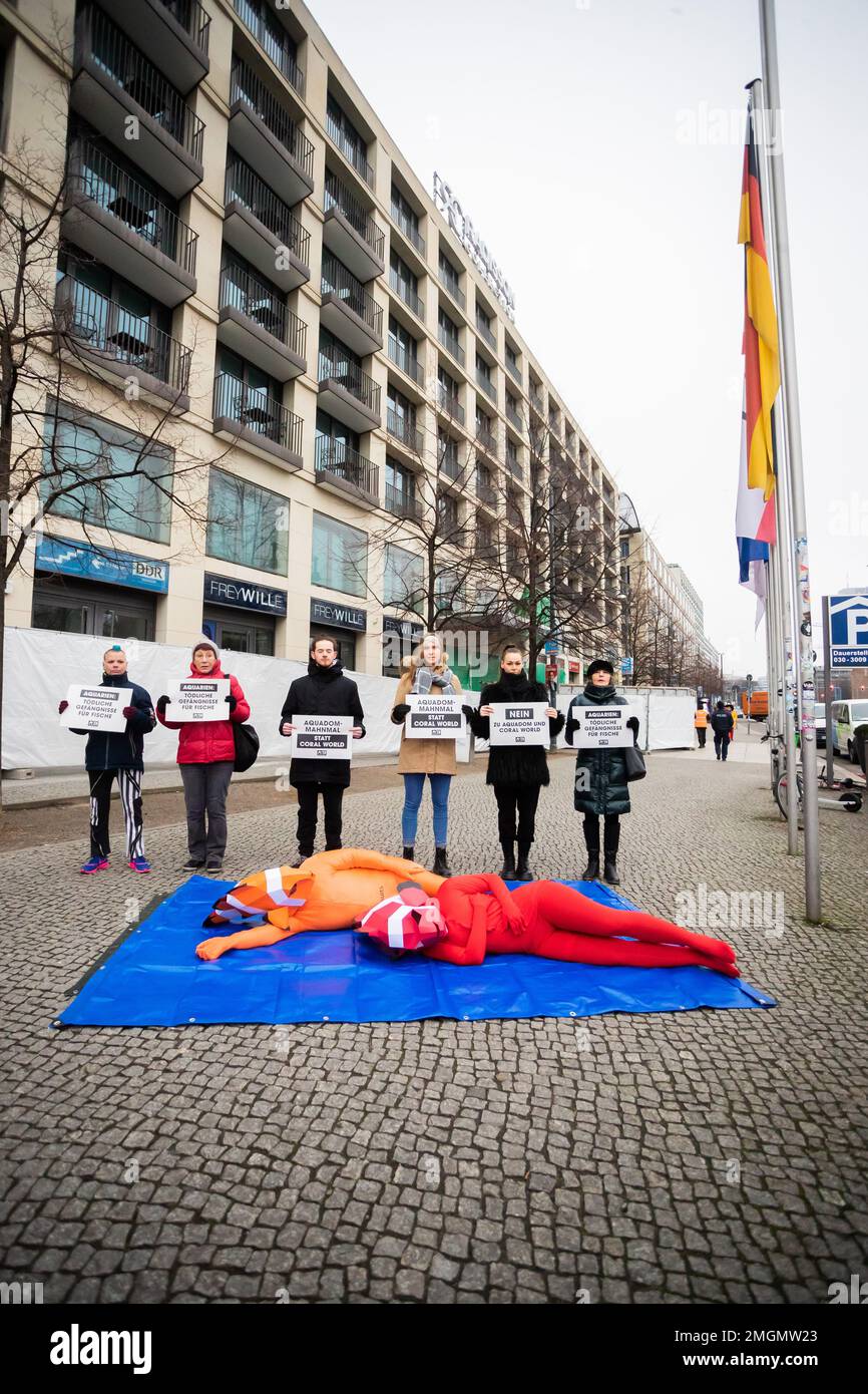 Berlin, Germany. 26th Jan, 2023. Activists dressed as fish lie outside ...