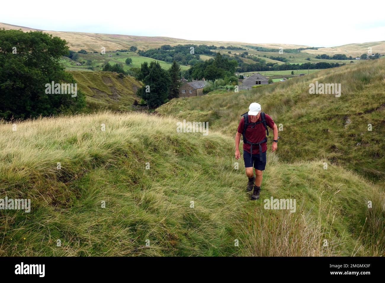 Man Walking on Path from the Hamlet of Outhgill to High Seat on ...