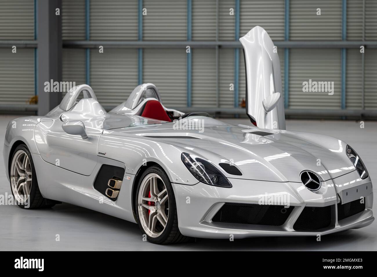 A luxury rare Mercedes-Benz in an aircraft hangar Stock Photo - Alamy