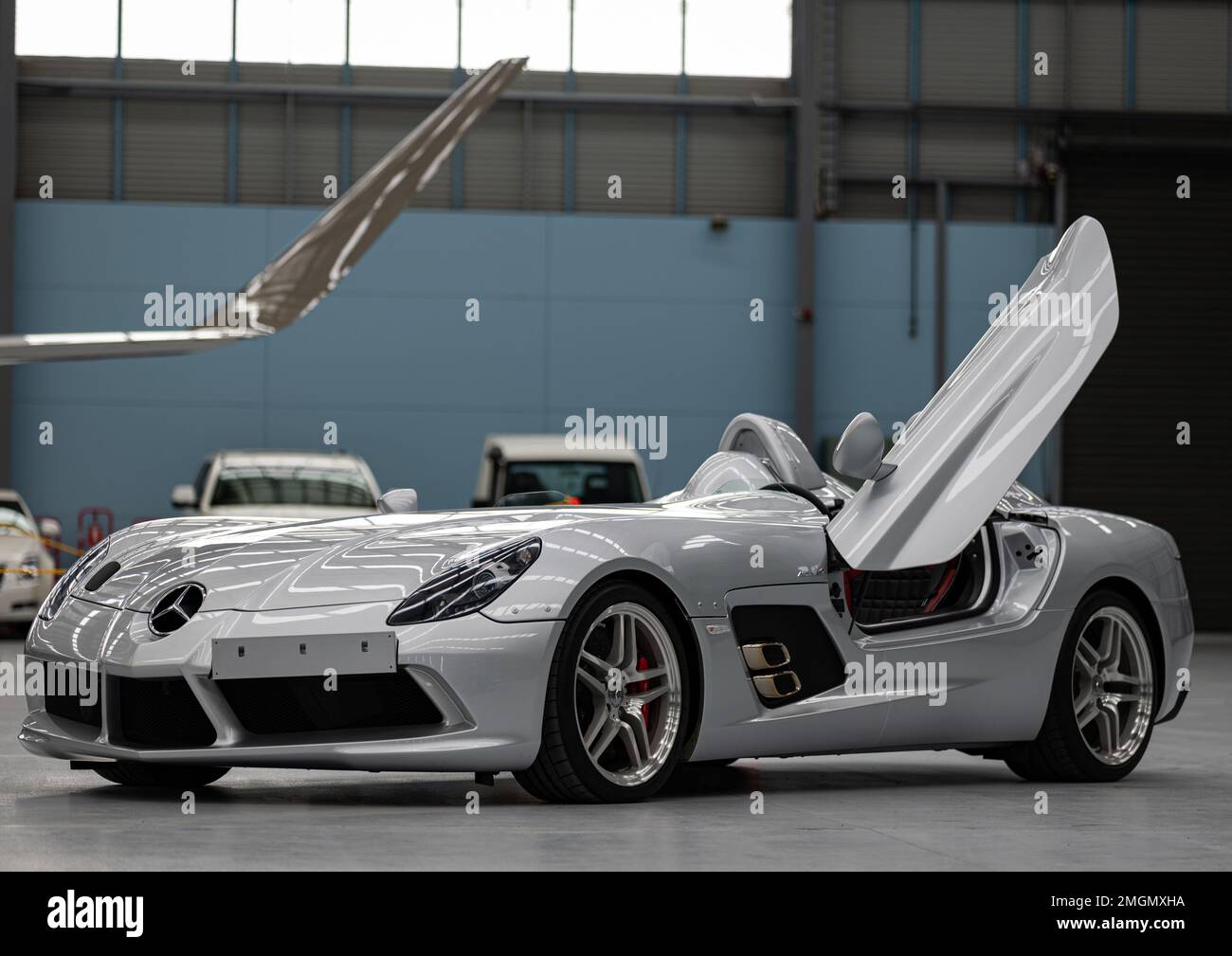 A luxury rare Mercedes-Benz in an aircraft hangar Stock Photo - Alamy