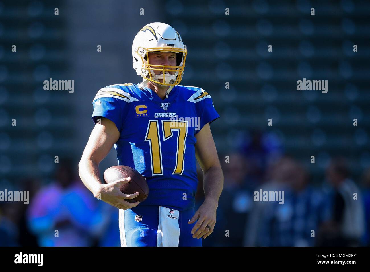Los Angeles Chargers quarterback Phillip Rivers warms up before an NFL ...